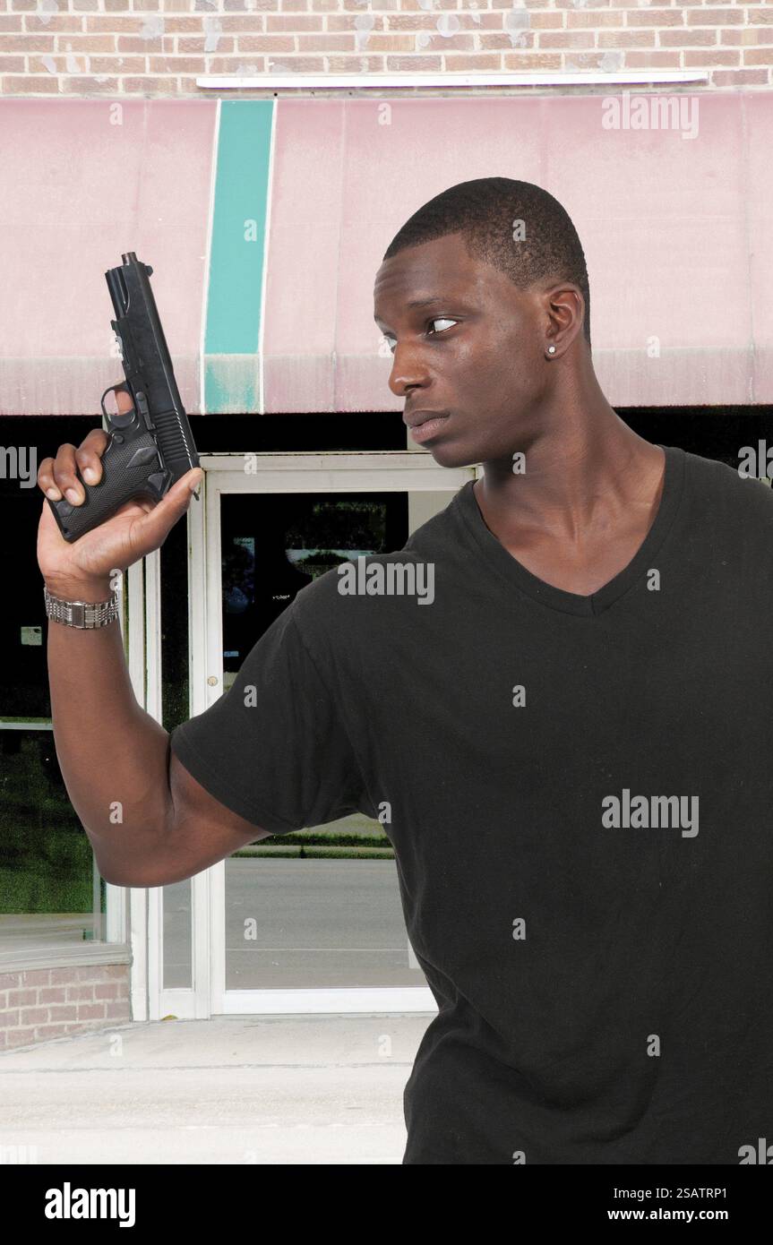 Police detective man on the job with a gun Stock Photo - Alamy