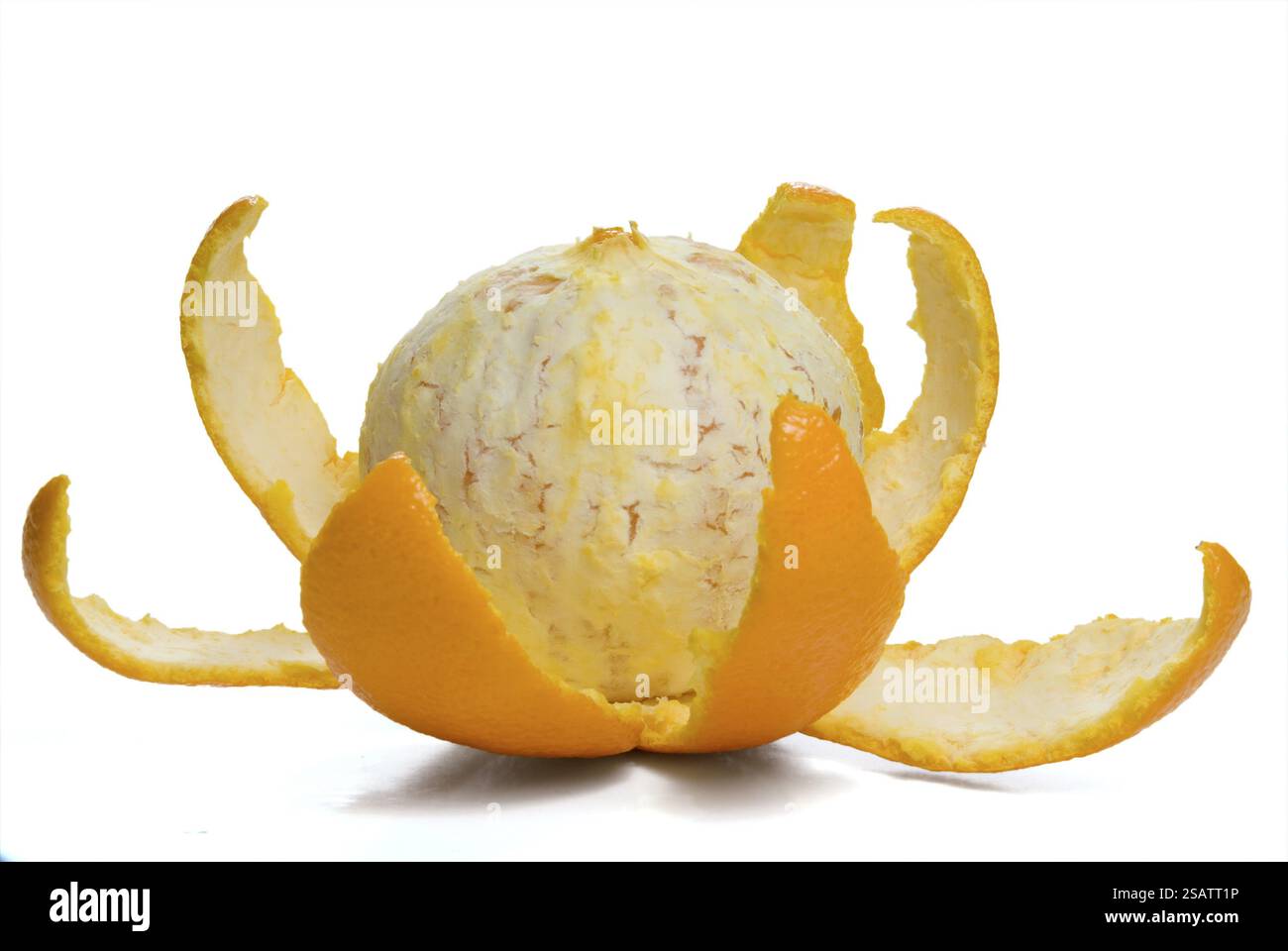 An Orange with the skin sliced into sections Stock Photo - Alamy