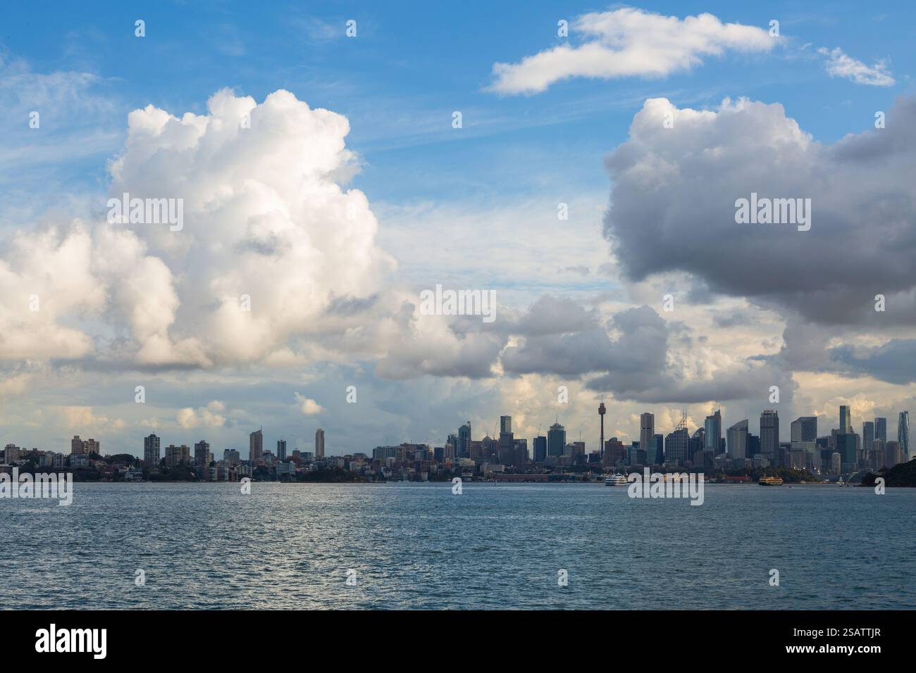 The distant skyline of Sydney, Australia, seen from across Sydney ...