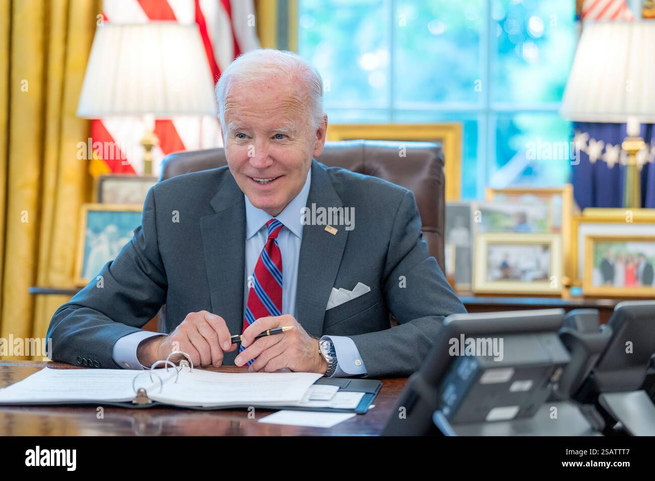 President Joe Biden talks on the phone with President Claudia Sheinbaum ...