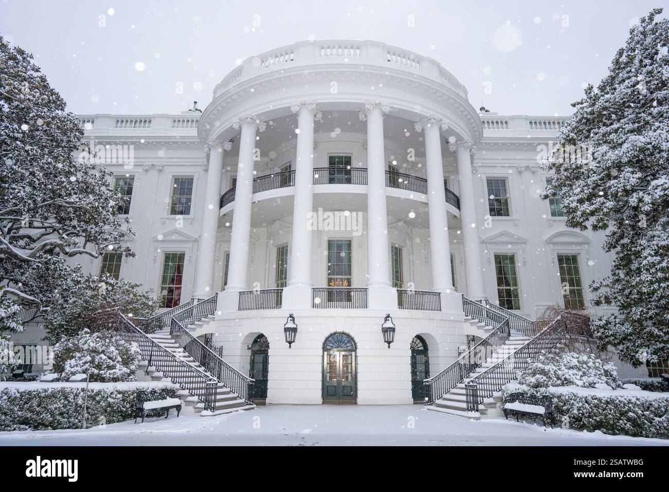 Snow falls on the White House, Monday, January 6, 2025, in Washington ...
