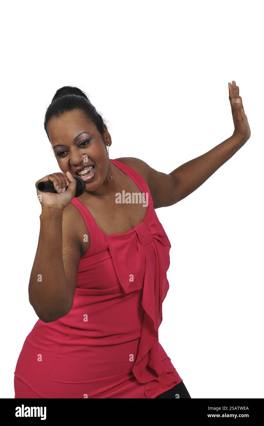 Beautiful woman singer performing at a concert Stock Photo - Alamy