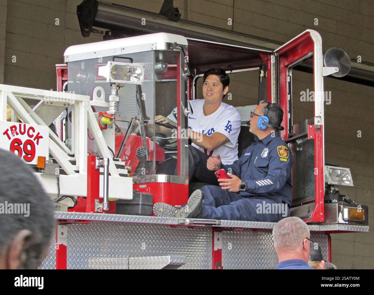 Los Angeles Dodgers star Shohei Ohtani sits in the cabin of a fire ...