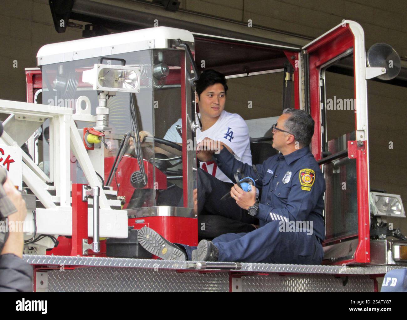 Los Angeles Dodgers star Shohei Ohtani sits in the cabin of a fire ...
