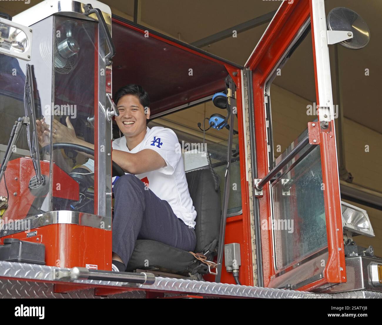 Los Angeles Dodgers star Shohei Ohtani sits in the cabin of a fire ...