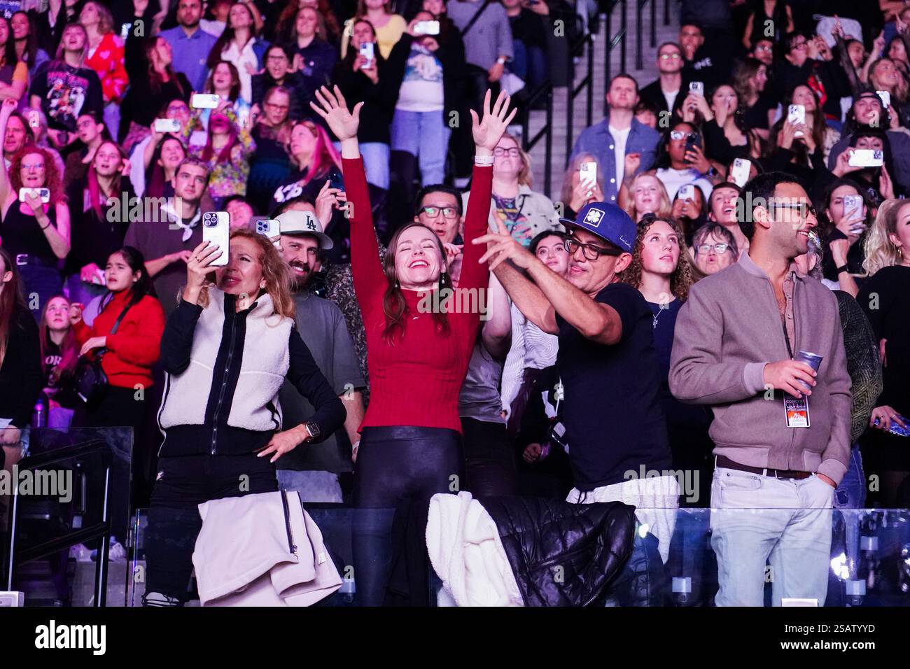 Audience members watch Katy Perry perform during the FireAid benefit concert on Thursday, Jan ...