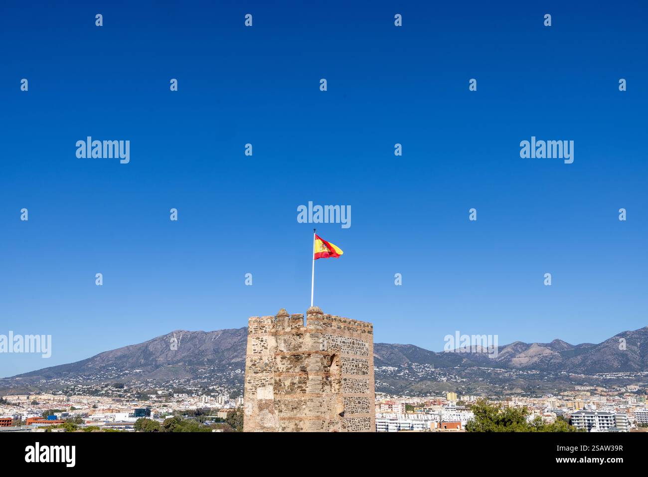 Photo of the Spanish flag showing the flag from Spain blowing in the wind on a clear sunny ...
