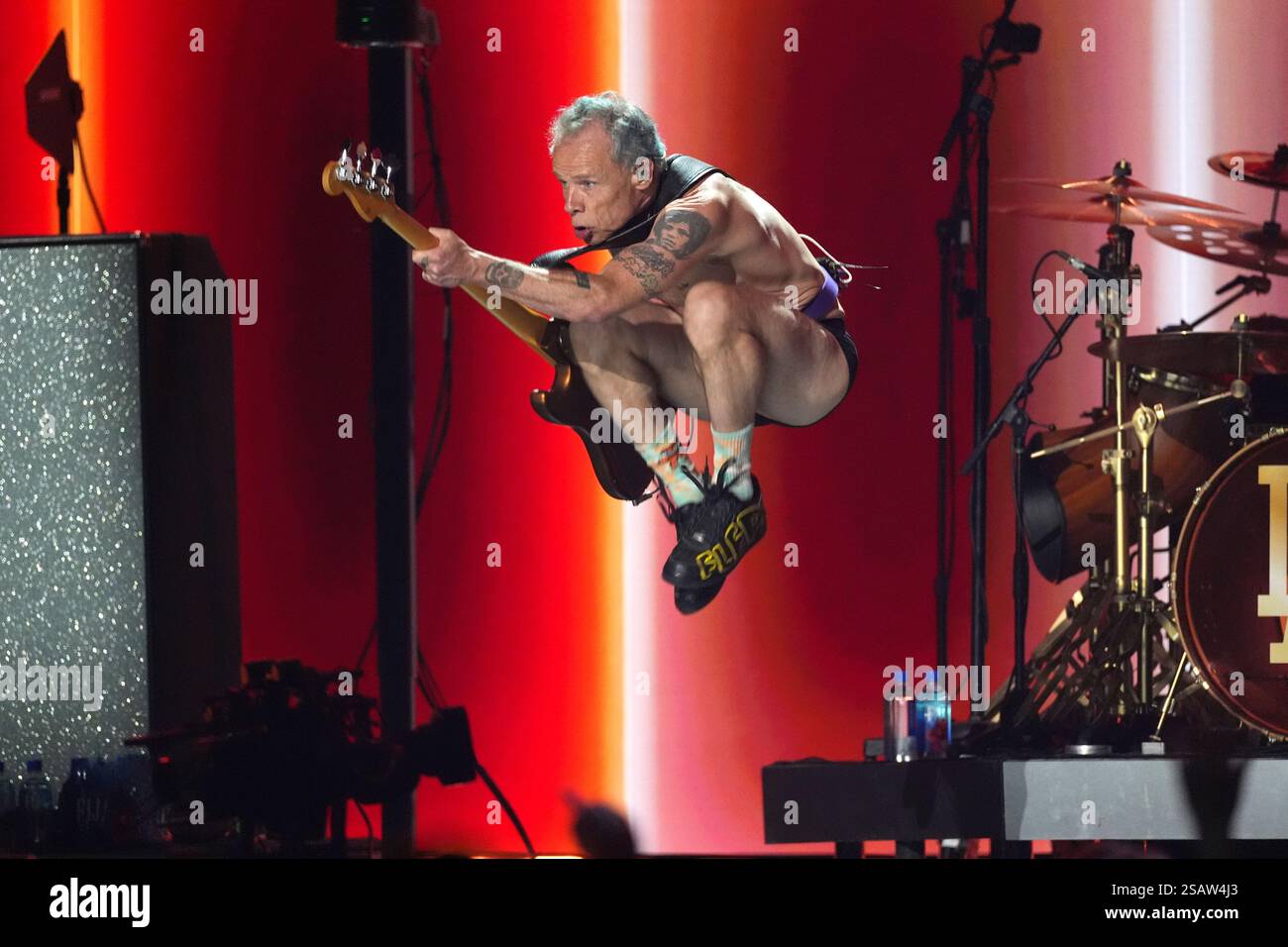 Flea of Red Hot Chili Peppers performs during the FireAid benefit ...