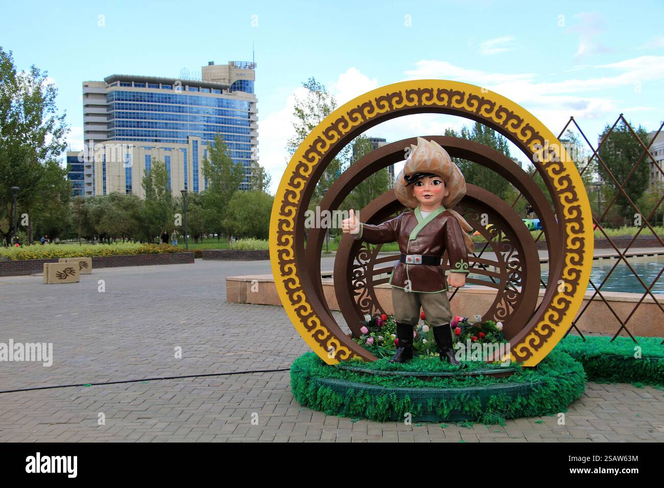 A park located in the city center. A painting with the symbol of Astana ...