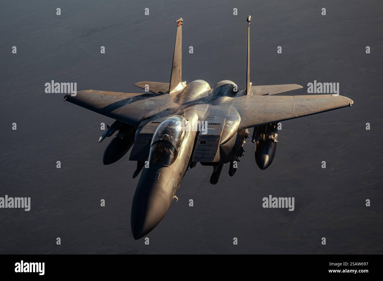 A U.S. Air Force F-15E Strike Eagle conducts combat air patrols over the U.S. Central Command ...
