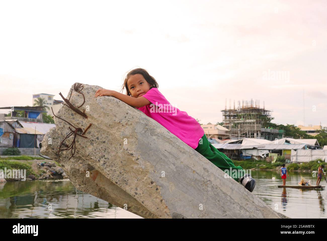 Dumaguete City, Negros Oriental, Philippines - January 30, 2025: A kid ...