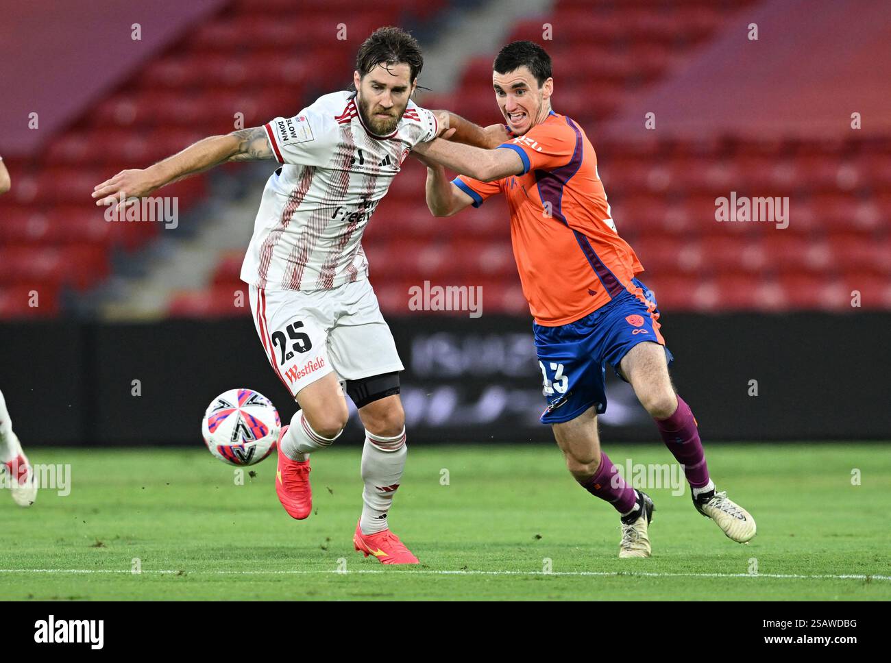 Joshua Brillante (left) of the Wanderers and Henry Hore (right) of the ...
