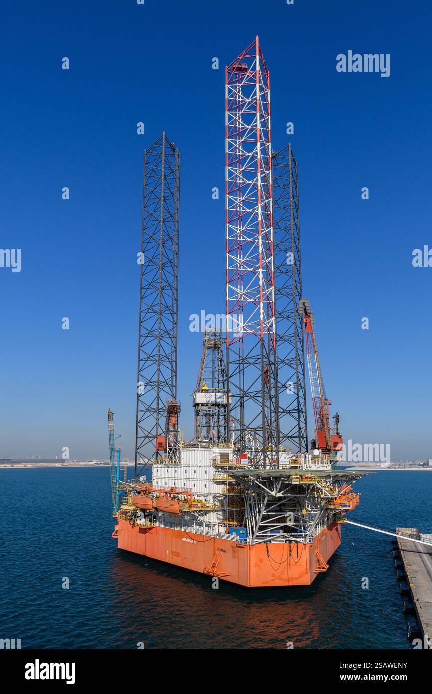 Manama, Bahrain - January 5, 2025: A towering offshore oil rig stands ...
