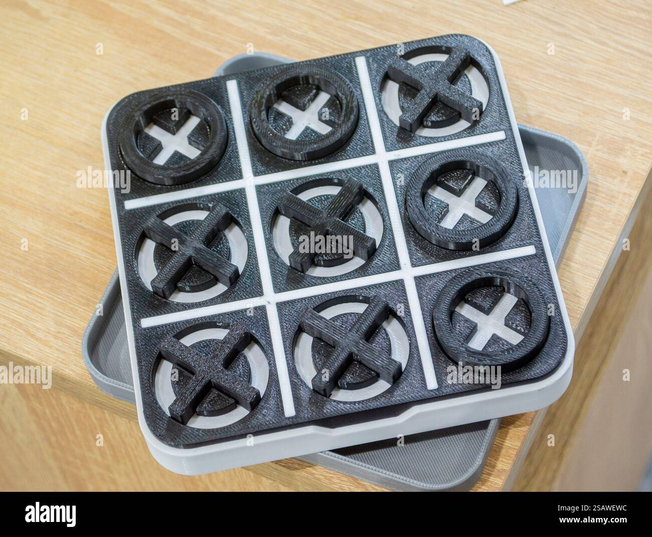 Model of the toy Tic-tac-toe printed on 3D printer close-up. Object ...