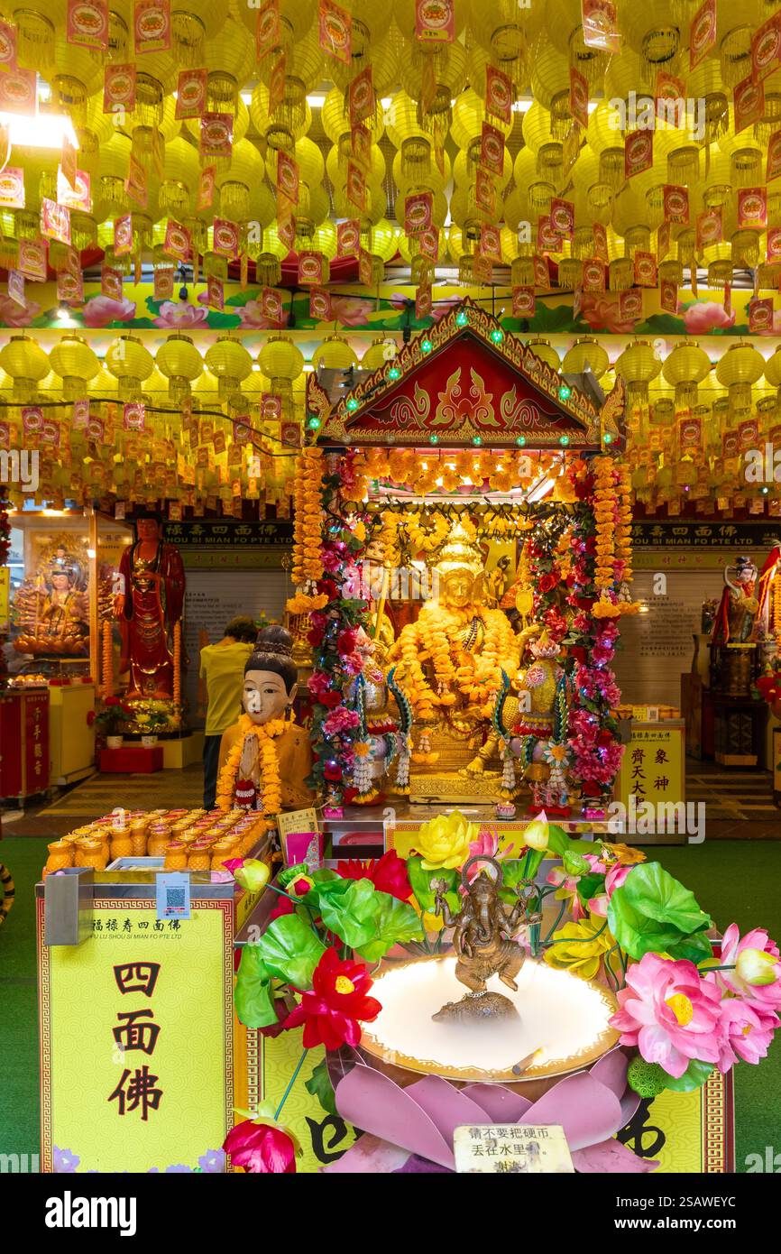 The four faced Buddha in downtown Singapore has four faces but he isn't ...