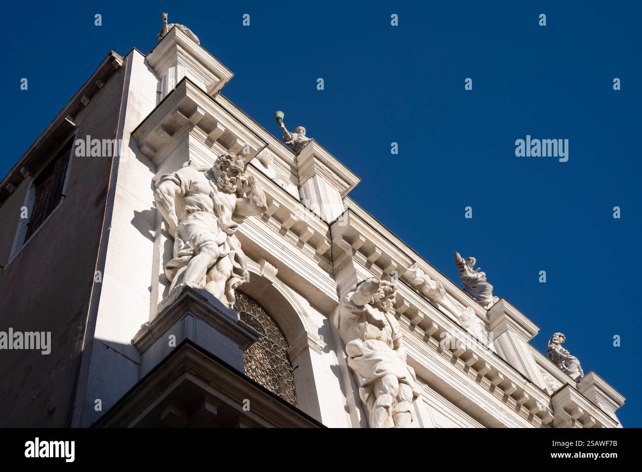Sculptures and monuments on facade of Church of the Ospedaletto, Church ...