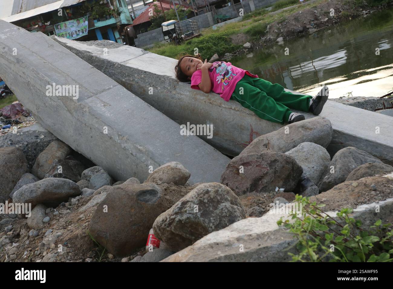 Dumaguete City, Negros Oriental, Philippines - January 30, 2025: A kid ...