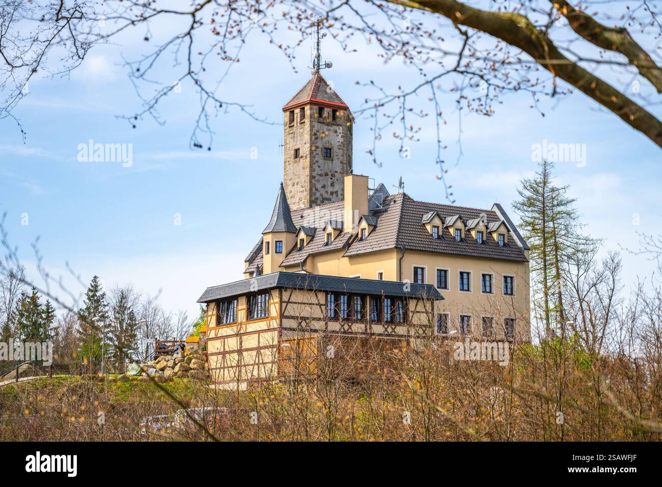 The Liberecka Vysina Lookout Tower stands tall against a clear sky in ...