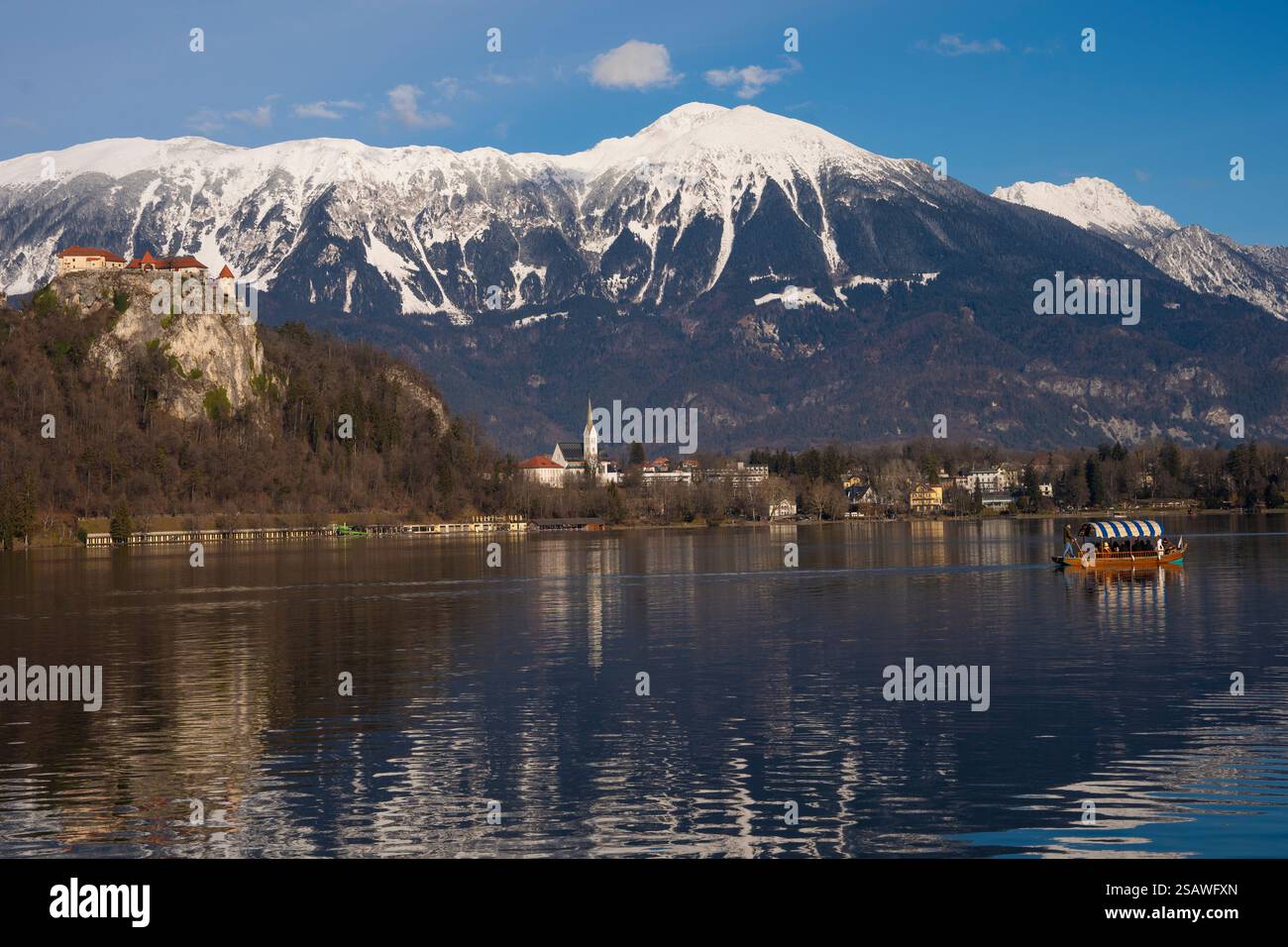 Beautiful mountains and Bled lake with small Pilgrimage Church. Bled ...
