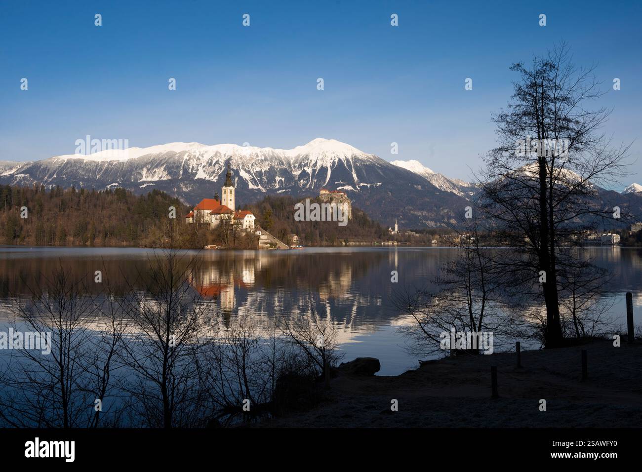 Beautiful mountains and Bled lake with small Pilgrimage Church. Bled ...