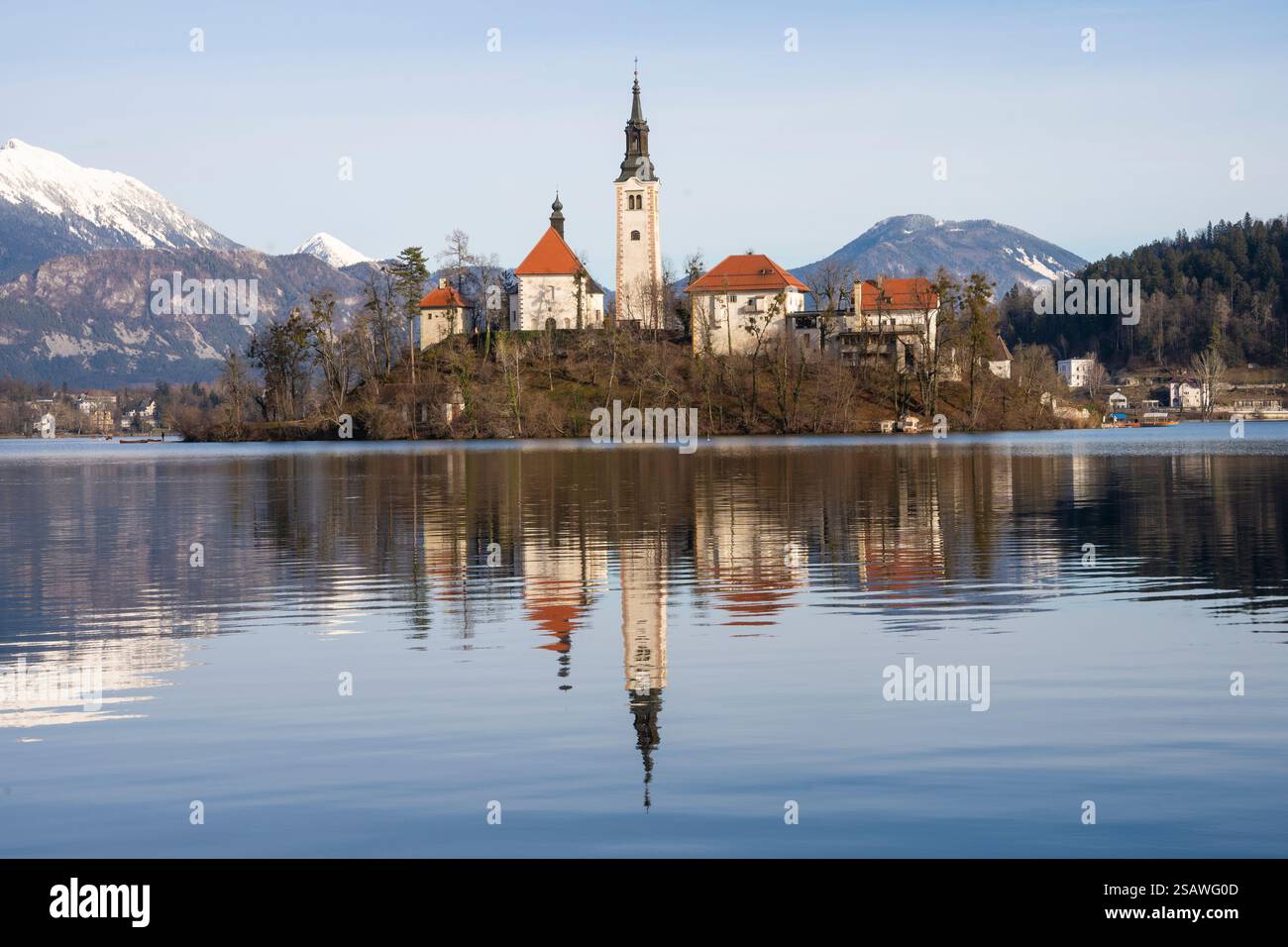 Beautiful mountains and Bled lake with small Pilgrimage Church. Bled ...