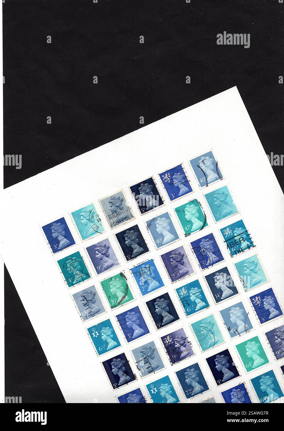 A collection of blue vintage Queen Elizabeth II postage stamps from the ...