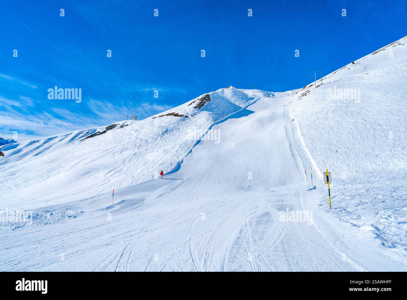 Winter landscape with ski slope on the First mountain in Swiss Alps in ...