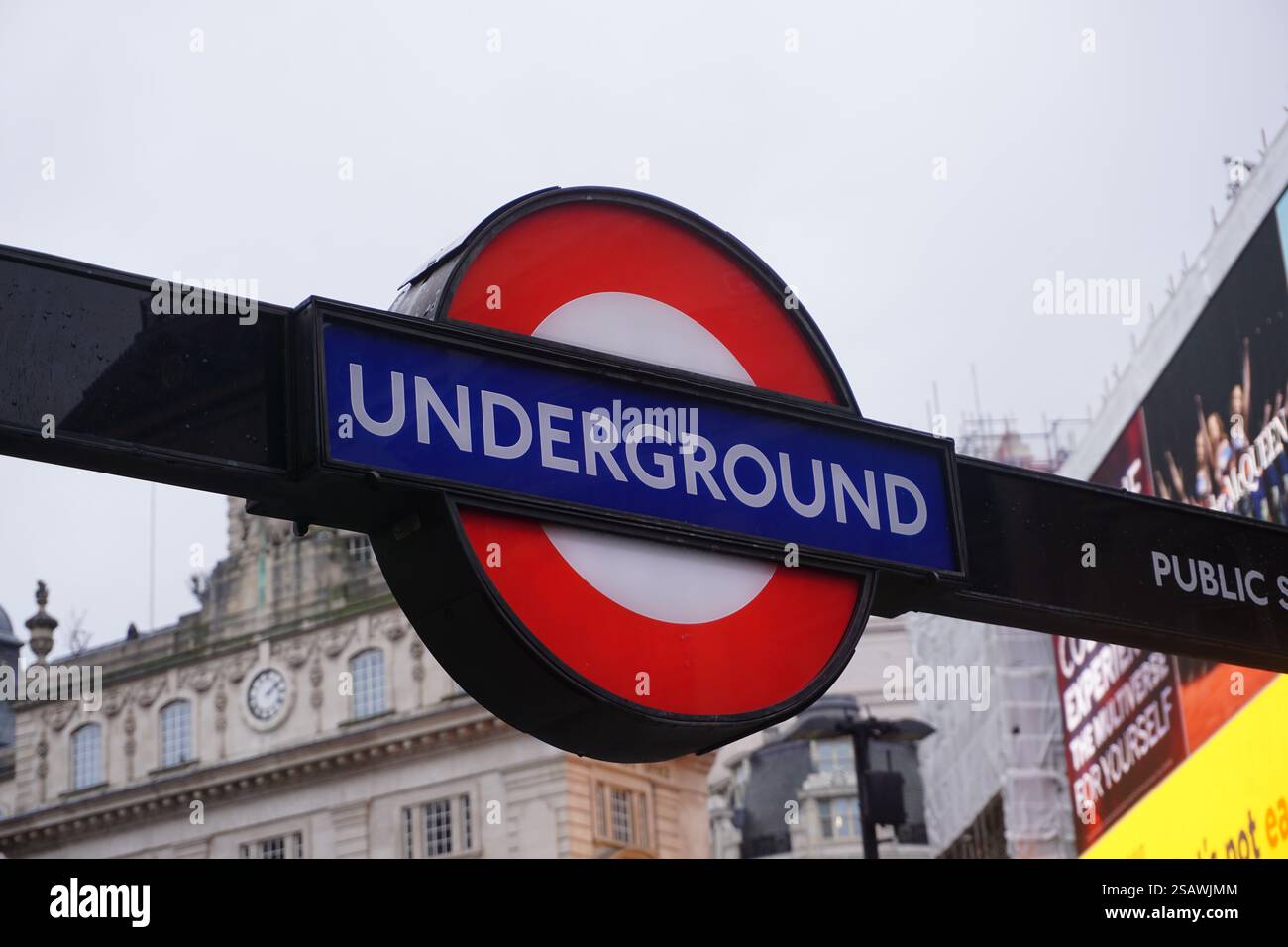 Underground logo on sign of London Tube station. Public transport in ...