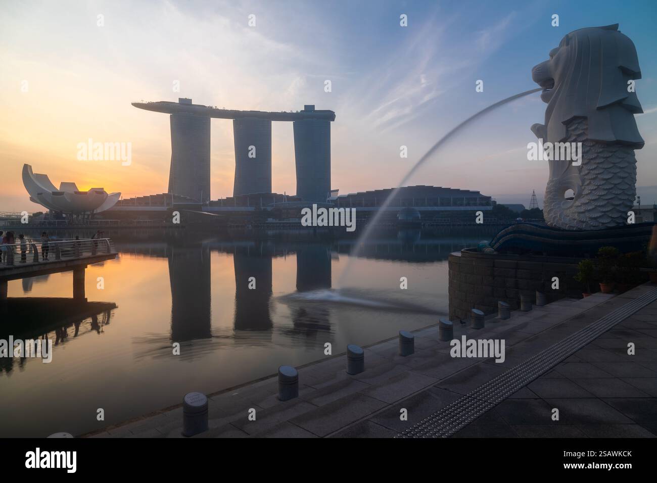sunrise at the promenade with Marina Bay Sands hotel, the iconic ...