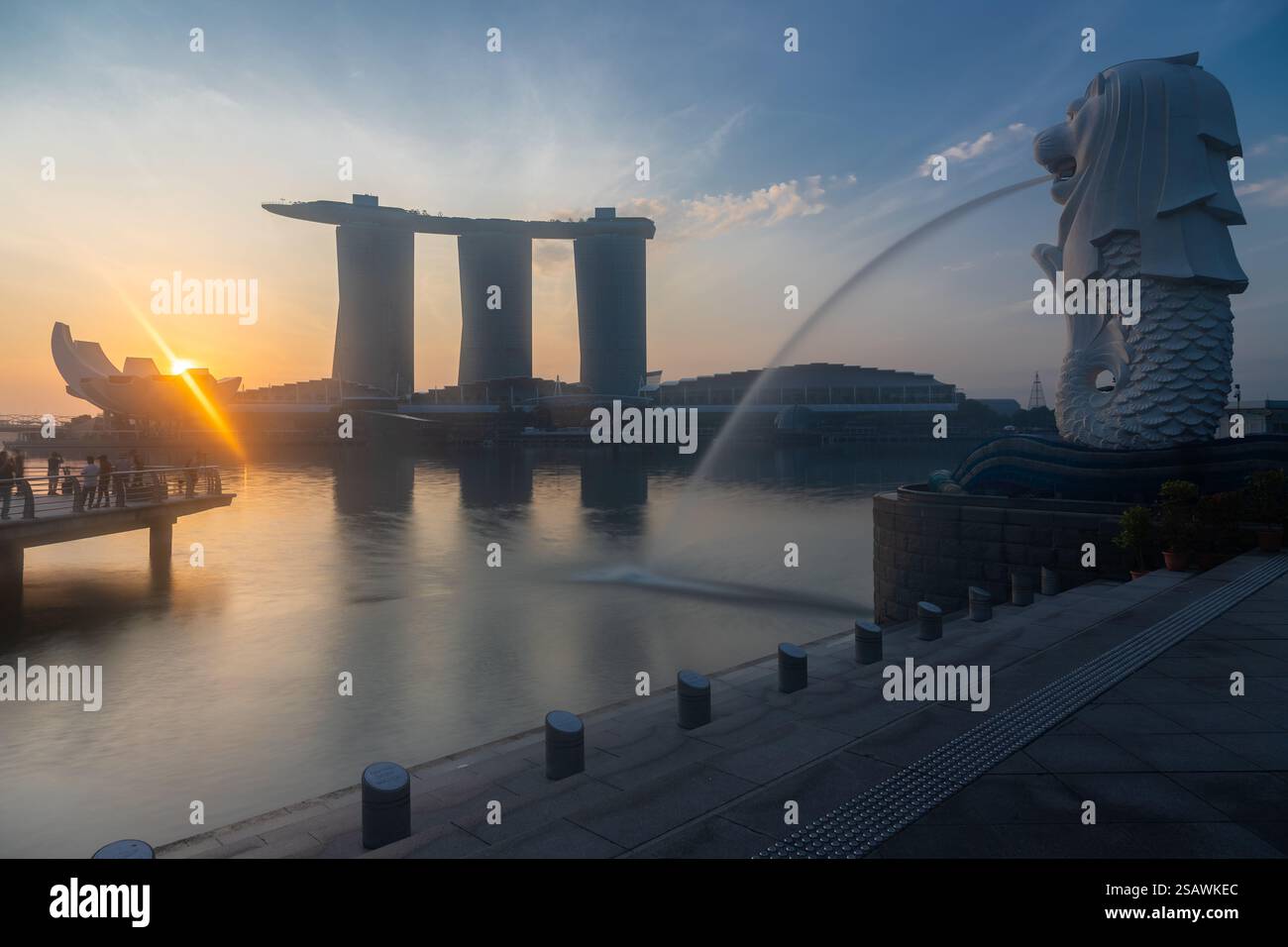 sunrise at the promenade with Marina Bay Sands hotel, the iconic ...