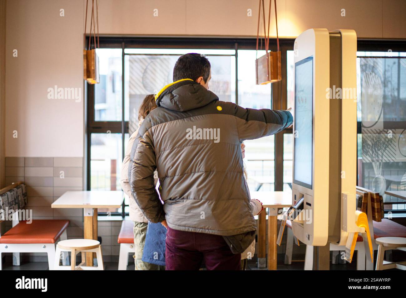 children and dad order food in a fast food restaurant Stock Photo - Alamy