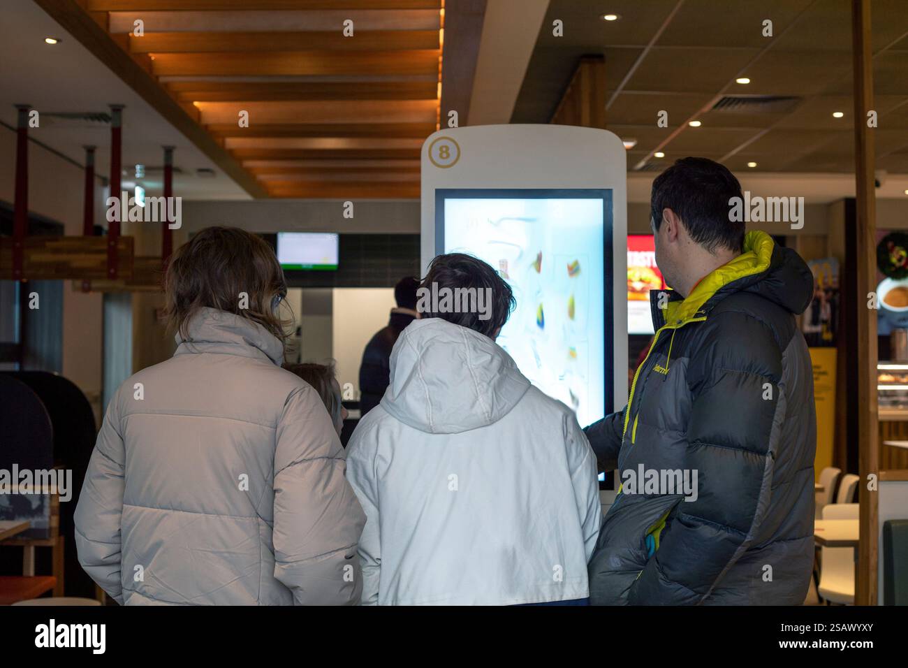 children and dad order food in a fast food restaurant Stock Photo - Alamy