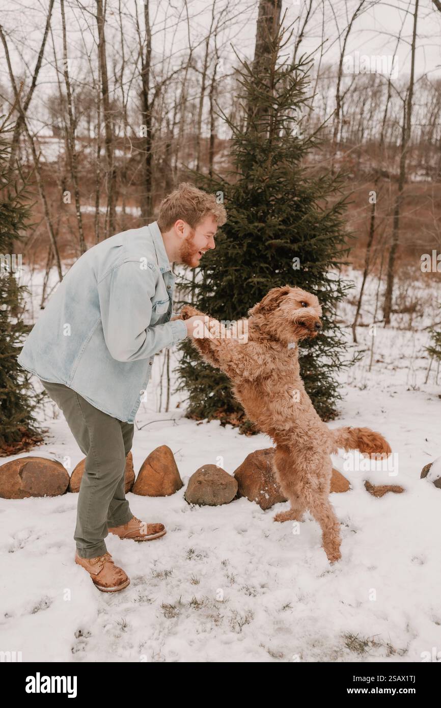 Happy guy with dog hi-res stock photography and images - Alamy