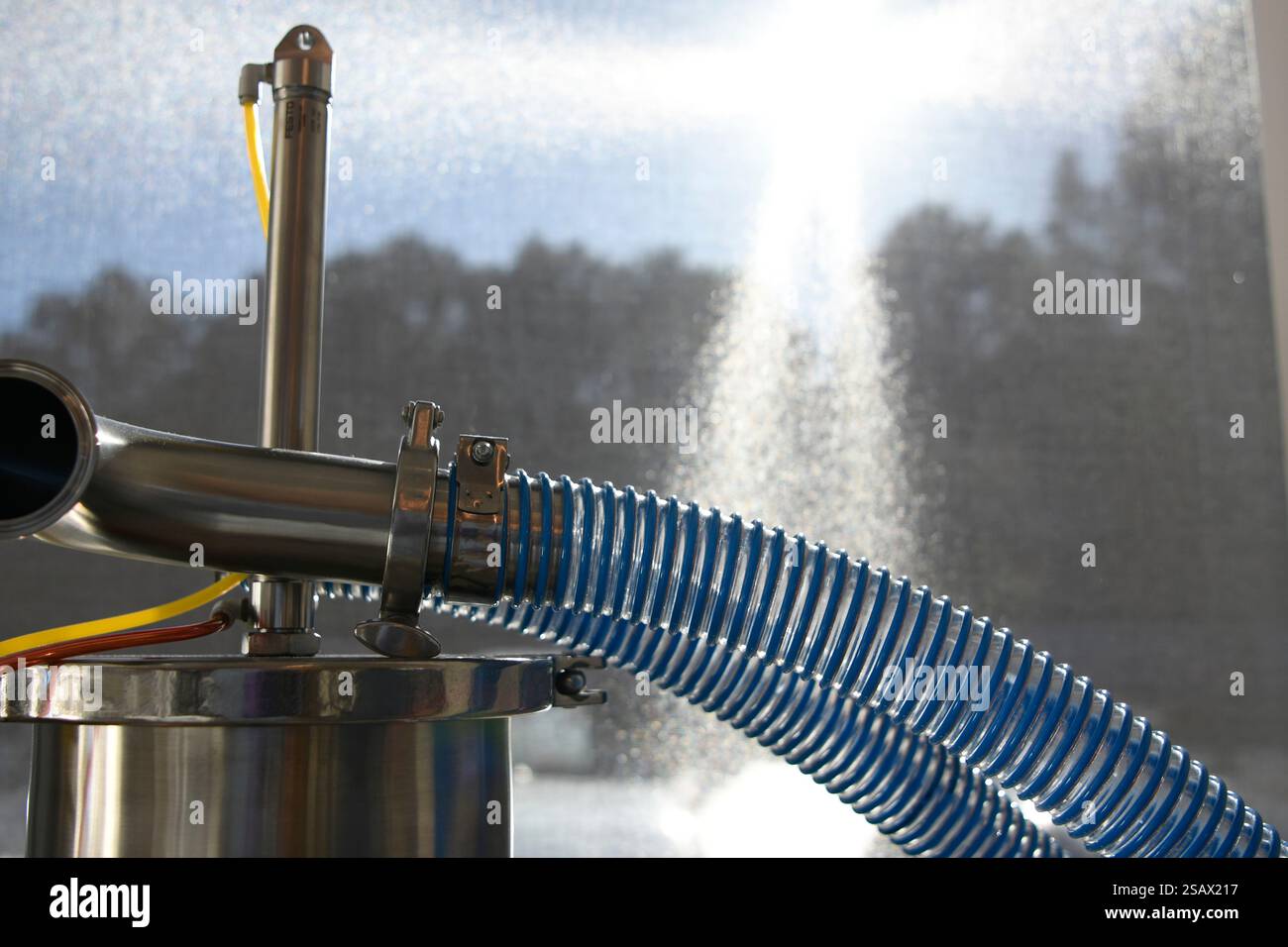 Large tube device next to window with dramatic light science lab Stock ...