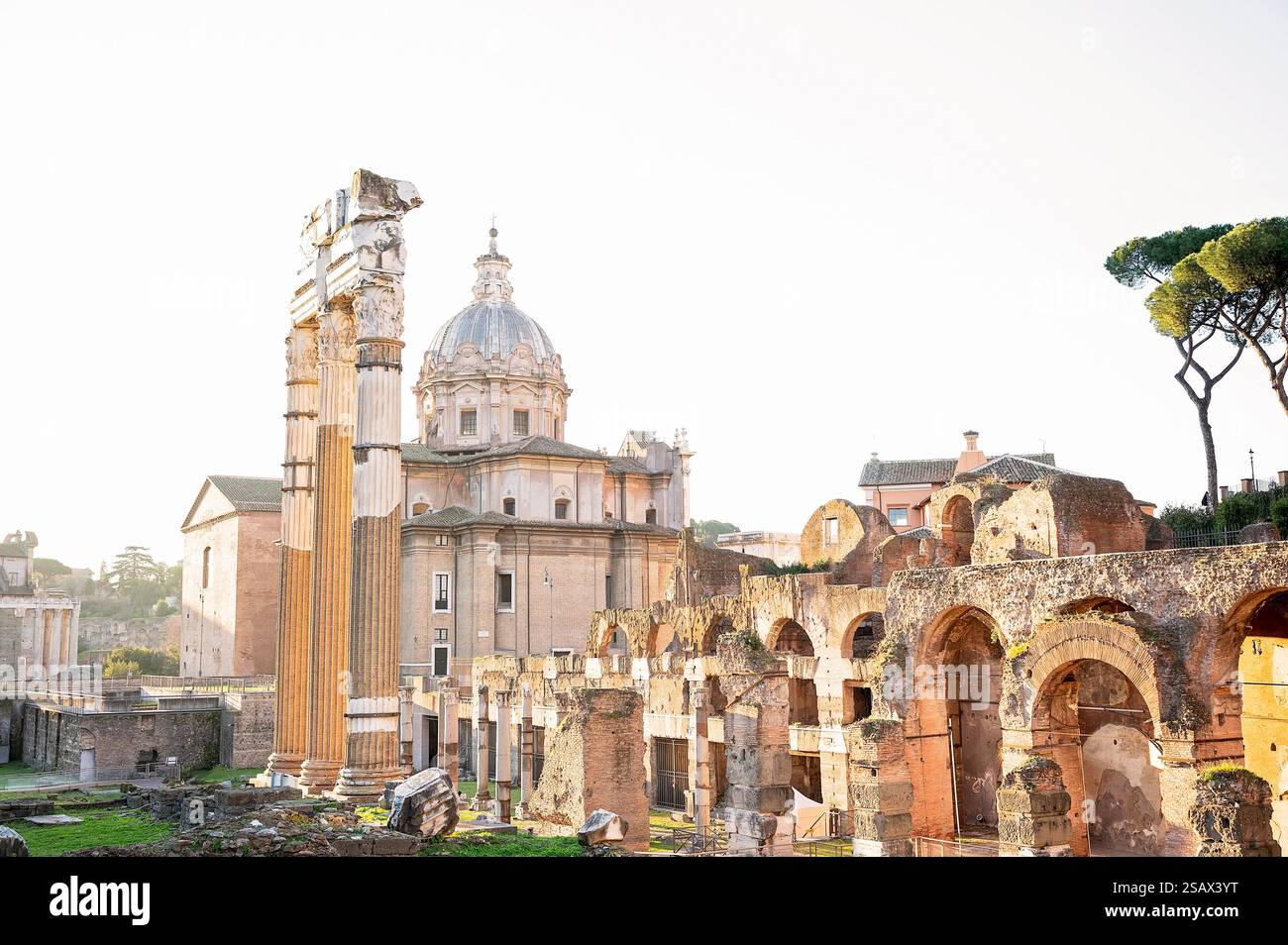 Ancient Roman ruins with a baroque church dome in Rome Stock Photo - Alamy