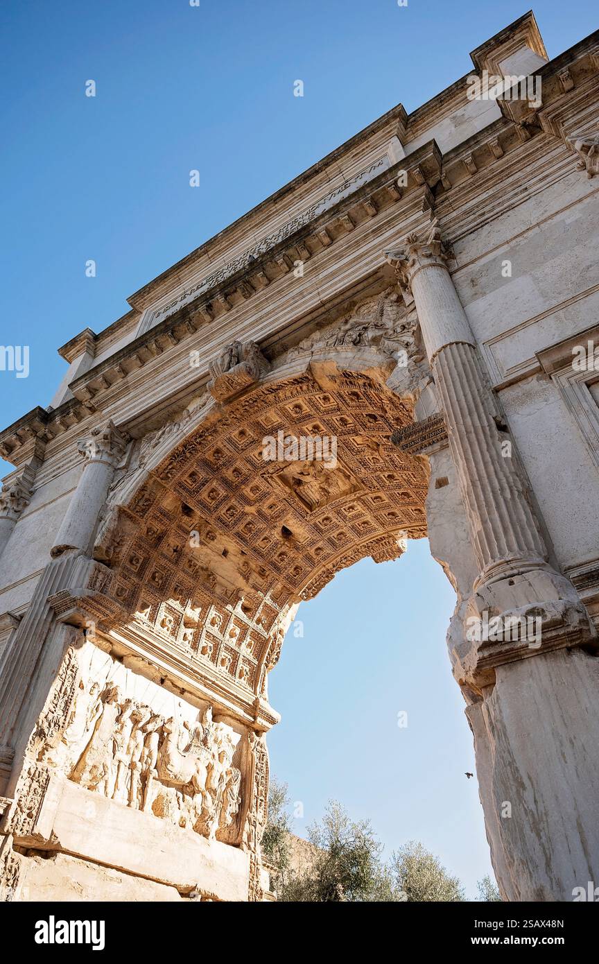 Low-angle view of a detailed ancient Roman triumphal arch Stock Photo ...