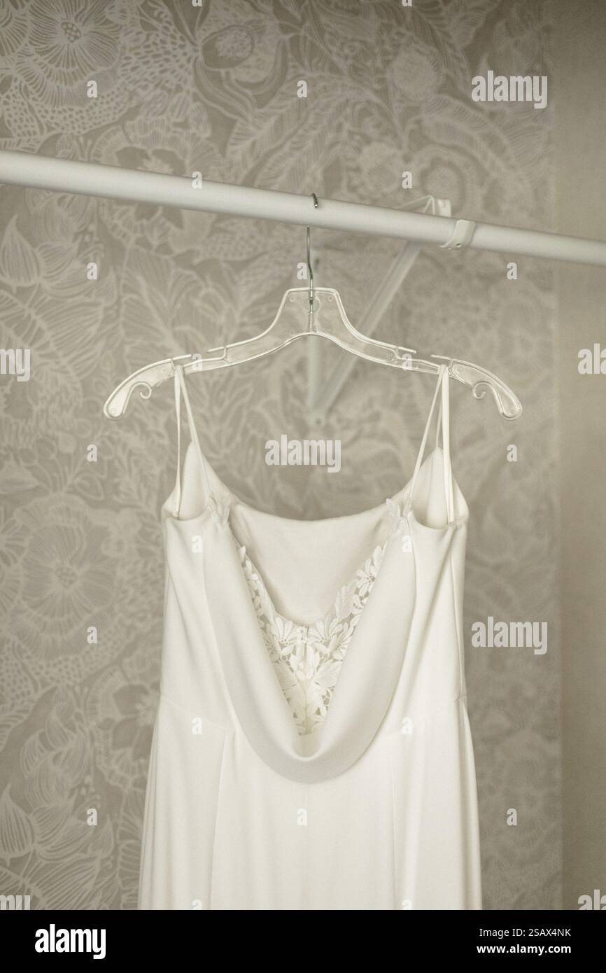 wedding dress hanging in the cloet Stock Photo - Alamy