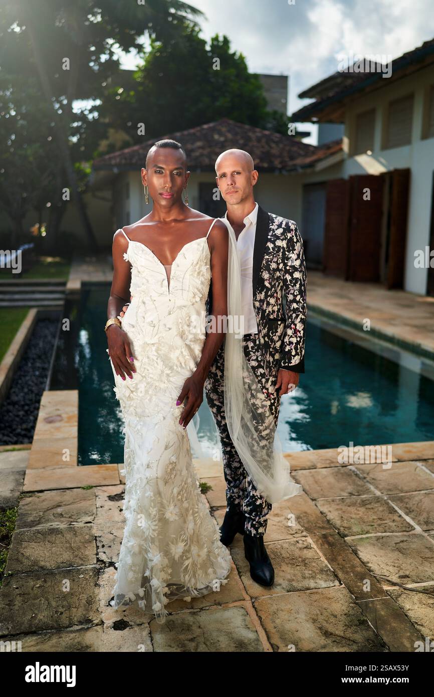 Tropical wedding with gender fluid black bride in white dress and LGBTQ ...