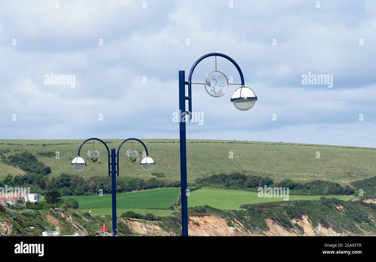 Decorative street lighting showing blue painted curved lamp post with ...