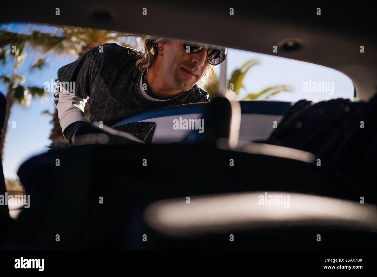 Putting in trunk hi-res stock photography and images - Alamy