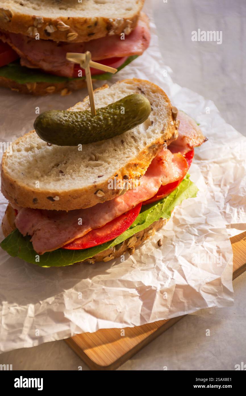 classic sandwich with veggies and bacon Stock Photo - Alamy