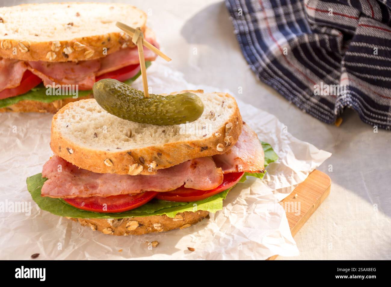 classic sandwich with veggies and bacon Stock Photo - Alamy