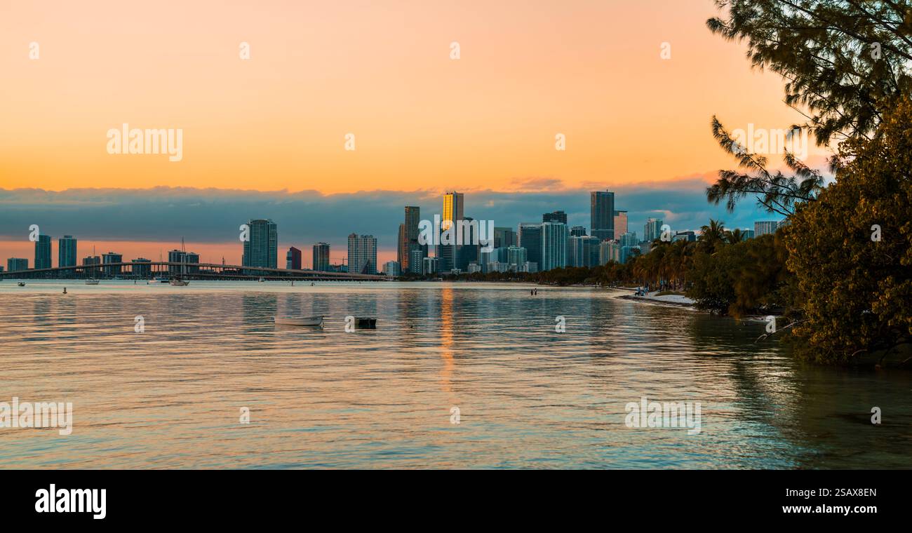 sunset in key Biscayne beach views miami skyline Stock Photo - Alamy