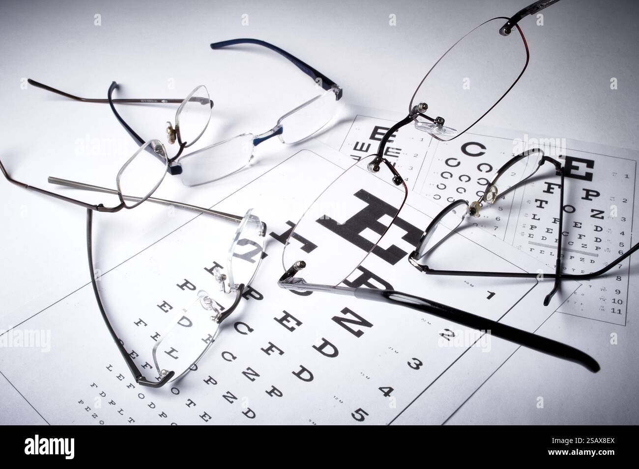 Reading glasses and eye charts Stock Photo - Alamy