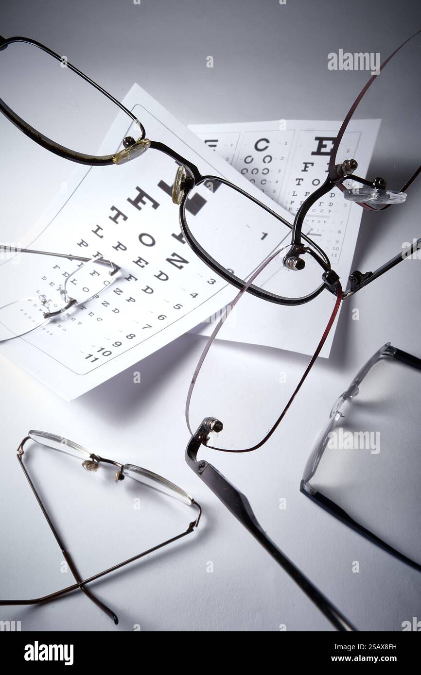 Reading glasses and eye charts Stock Photo - Alamy