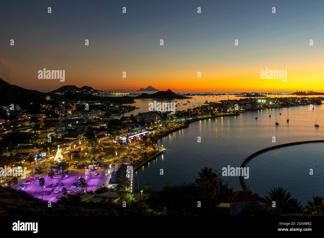 View at night of the harbor and the bay of Marigot in the Caribbean ...