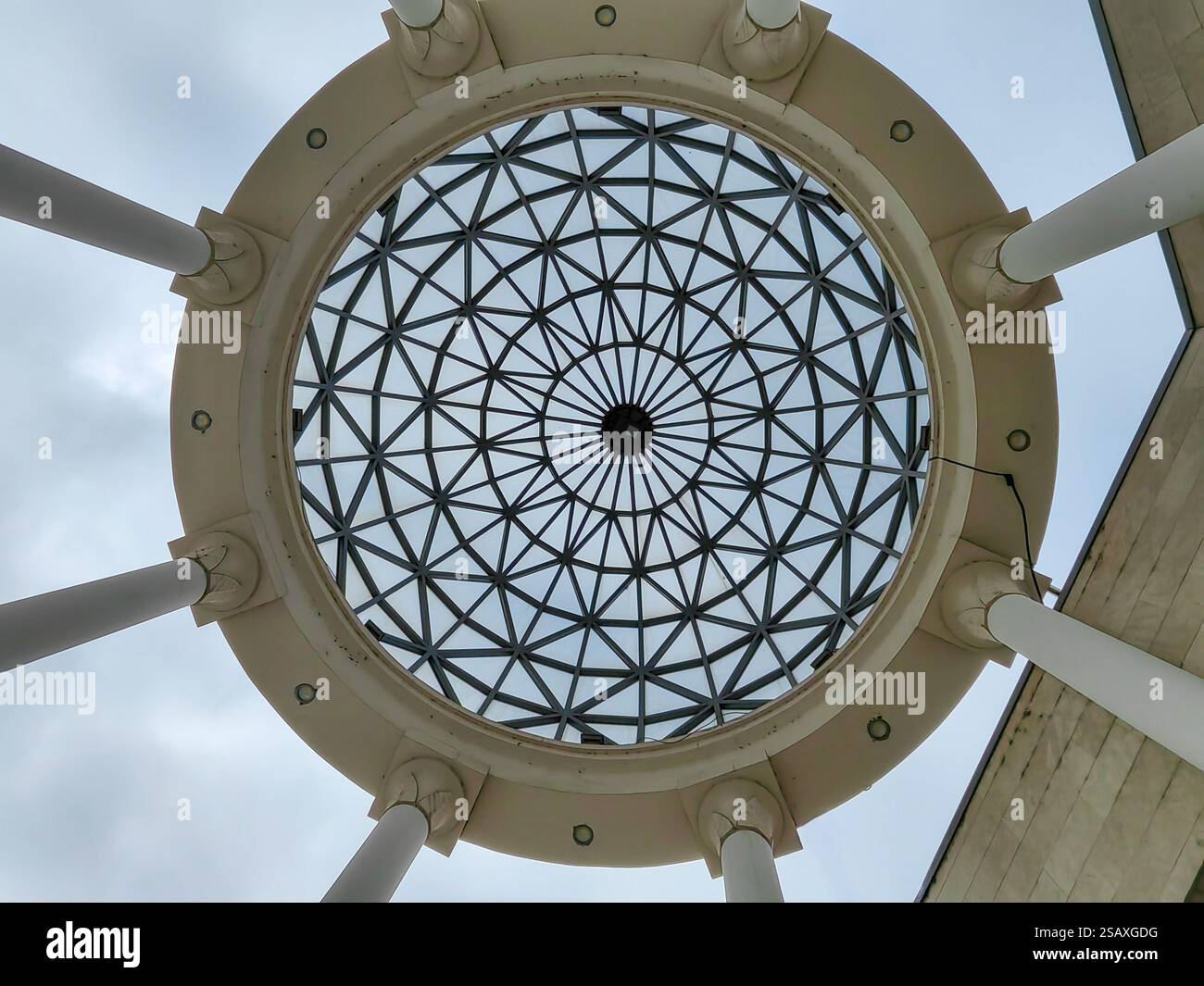 Ornamental Circle in the Sky: Rooftop and Concrete Pillars from a Low ...
