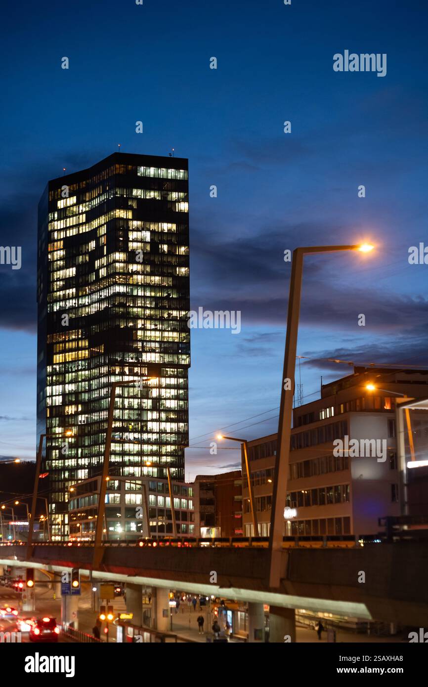 24-01-2025 Zurich, Switzerland. Prime Tower glass skyscraper office building at blue hour ...