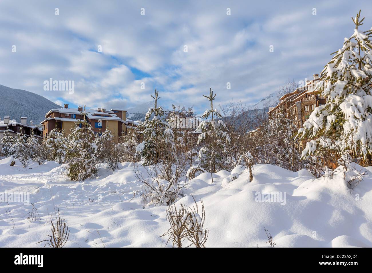 Bansko, Bulgaria winter street view, houses and Pirin snow mountain ...