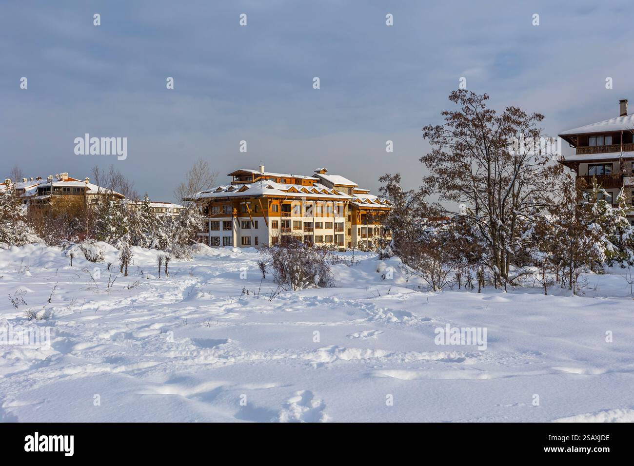 Bansko, Bulgaria winter street view, houses and Pirin snow mountain ...